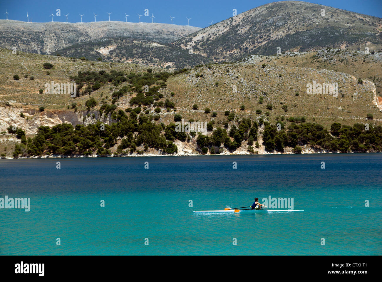 Rower with mountain background, Argostoli Bay, Argostoli, Kefalonia ...