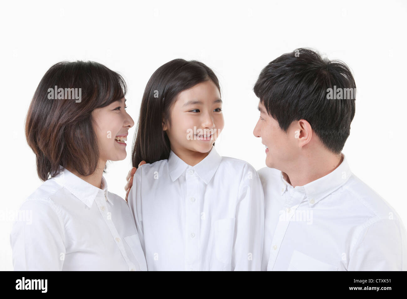 A family smiling together Stock Photo - Alamy