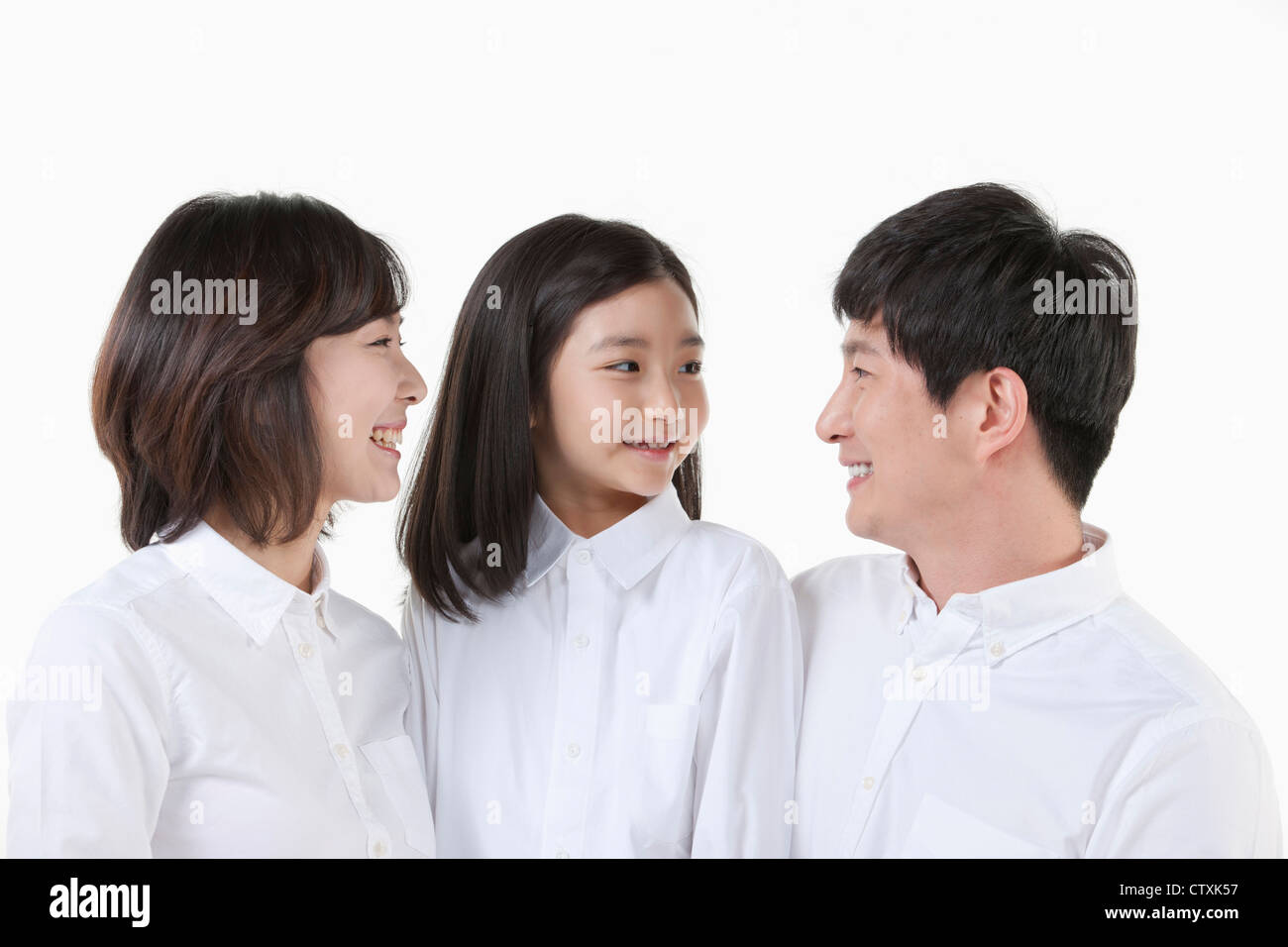 A family smiling together Stock Photo - Alamy