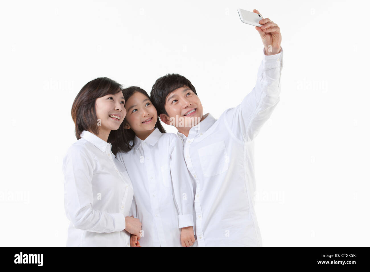 A family taking a picture together Stock Photo - Alamy