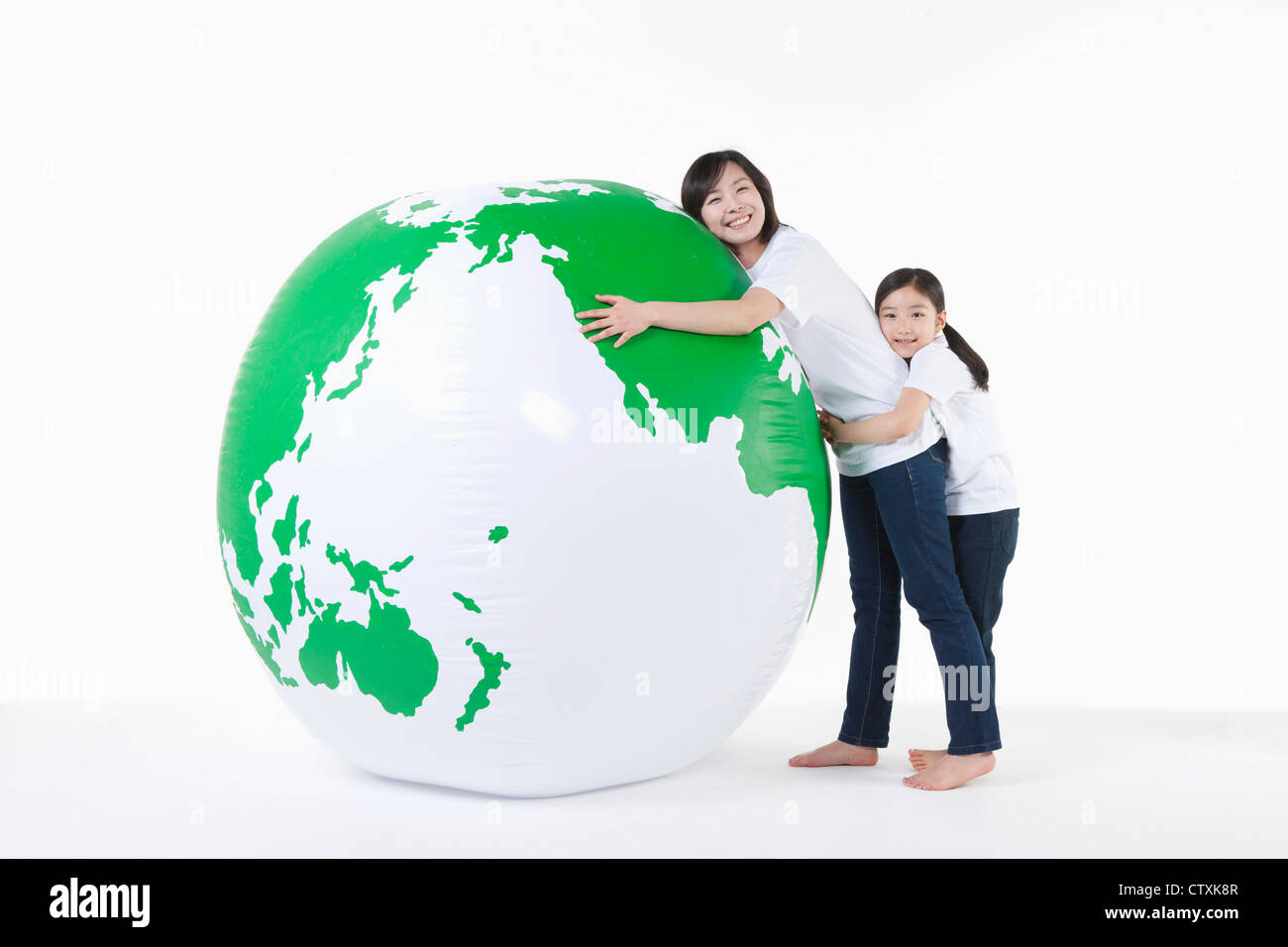 Hugging globe hi-res stock photography and images - Alamy