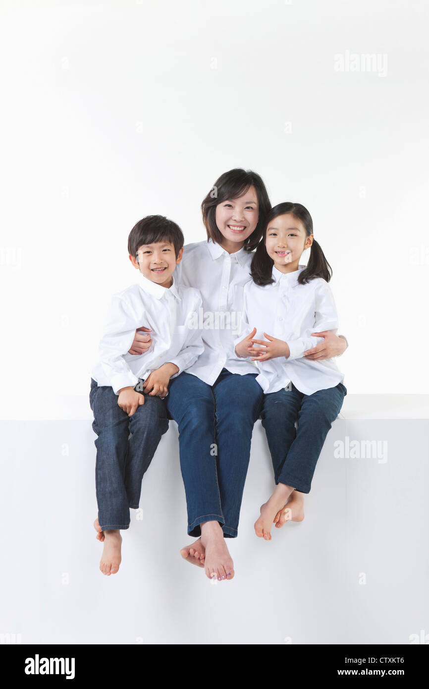 A happy family smiling together Stock Photo - Alamy