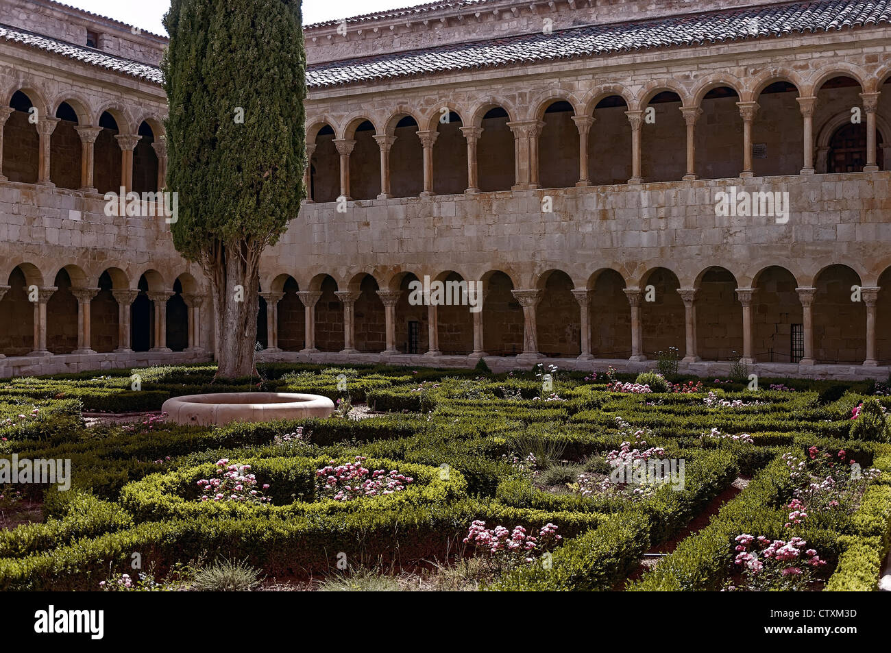 Romanesque cloister of the Benedictine Abbey of Silos and the garden ...