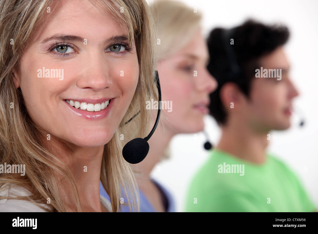 Row of call-center workers Stock Photo - Alamy