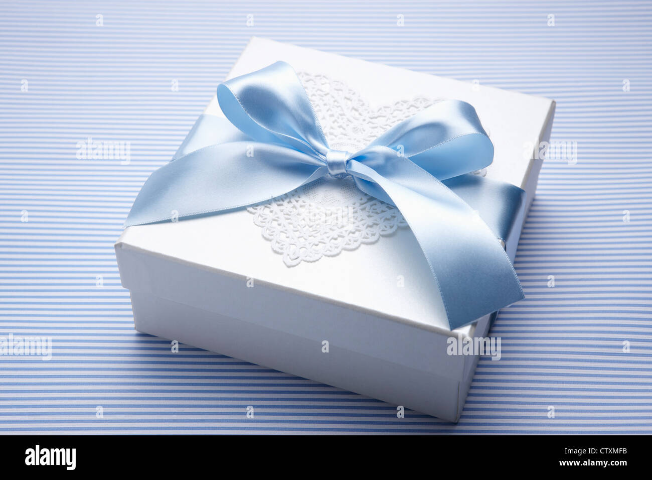 Blue ribbon gift box Stock Photo - Alamy