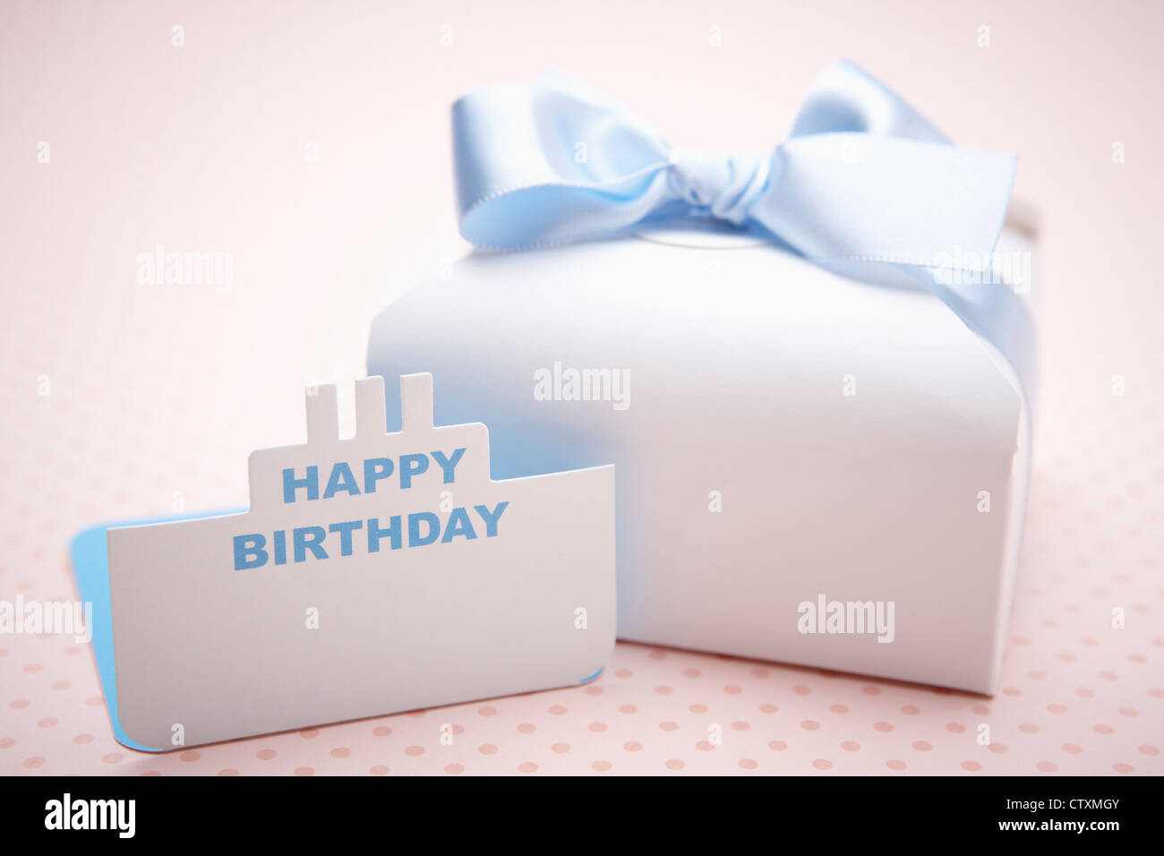 Blue birthday card and gift box Stock Photo - Alamy