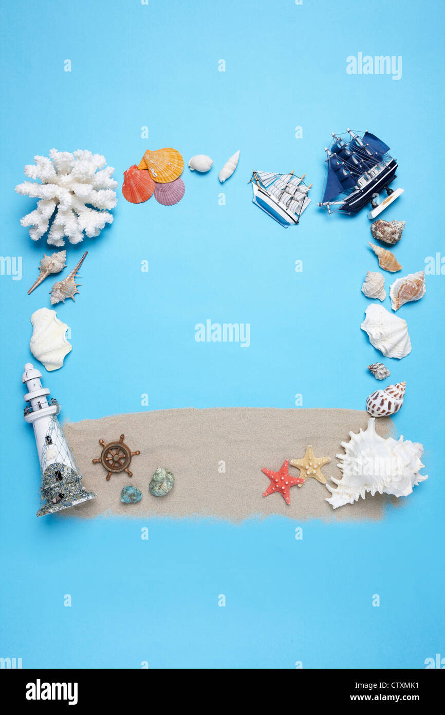 Shell, ship, and light house frame Stock Photo - Alamy