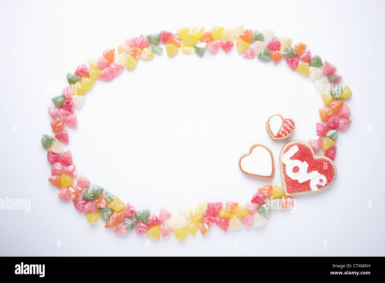 Candy and heart cookie frame Stock Photo - Alamy