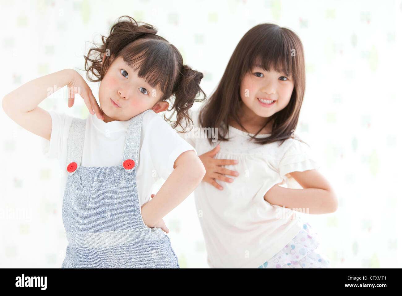 Posing girls Cut Out Stock Images & Pictures - Alamy