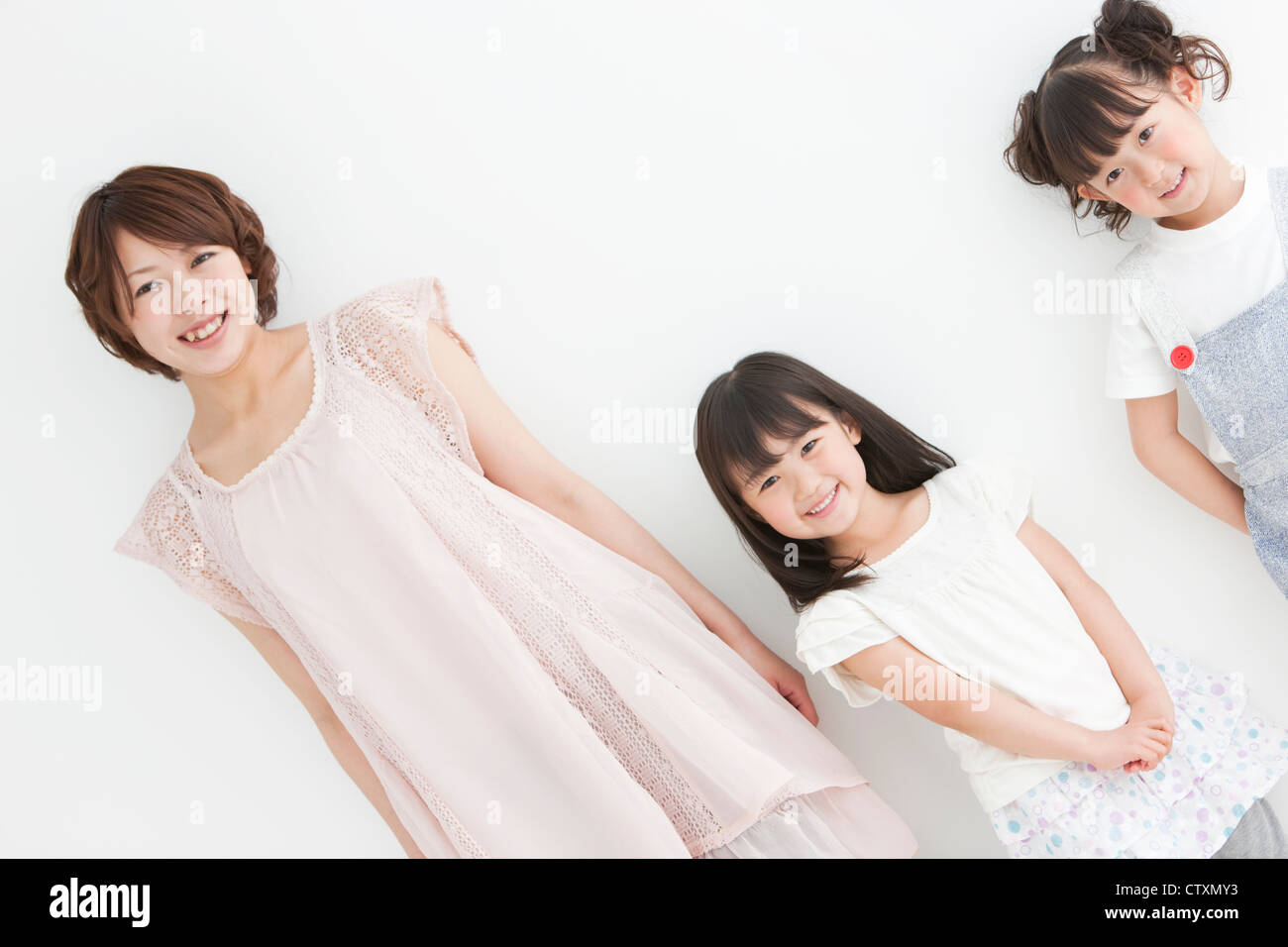 Family With Two Children, Smiling Stock Photo - Alamy