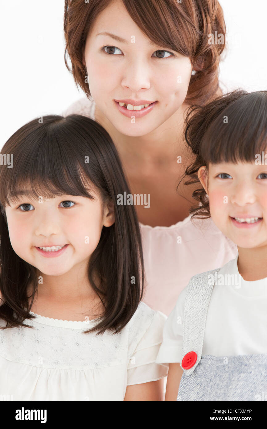 Family With Two Children, Smiling Stock Photo - Alamy