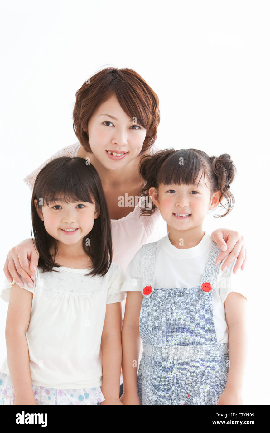 Family With Two Children, Smiling Stock Photo - Alamy