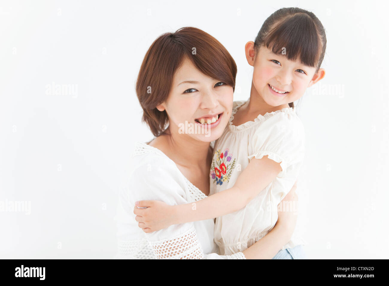 Family, Smiling and Embracing Stock Photo - Alamy