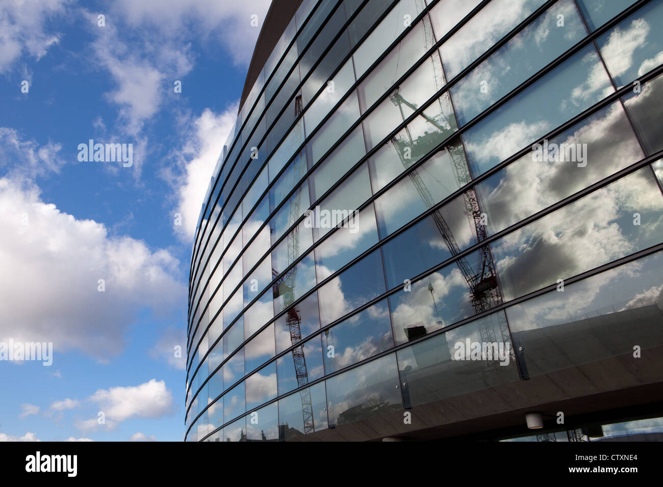 Reflections in a plate glass building Stock Photo - Alamy
