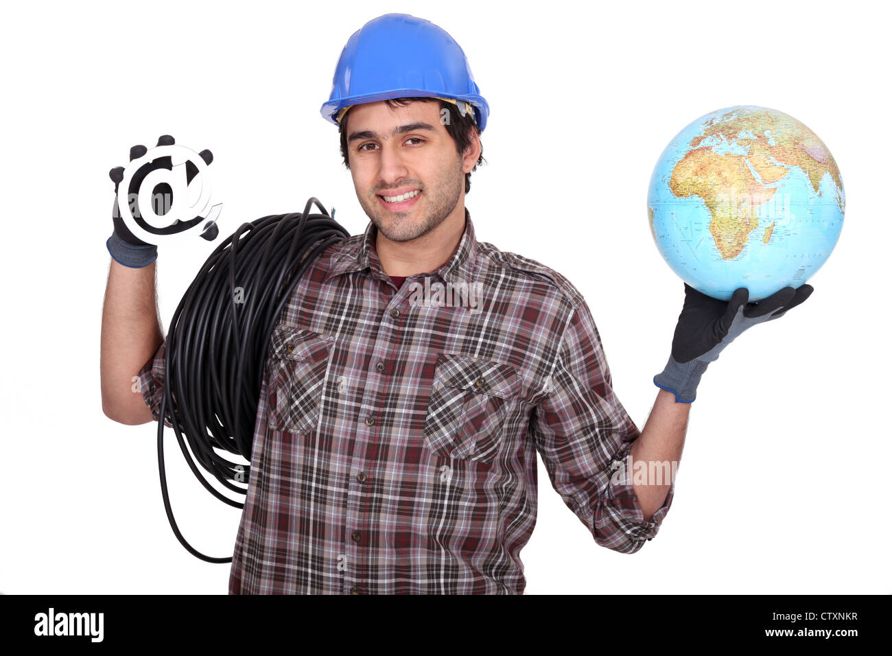 Electrician holding globe and at symbol Stock Photo - Alamy