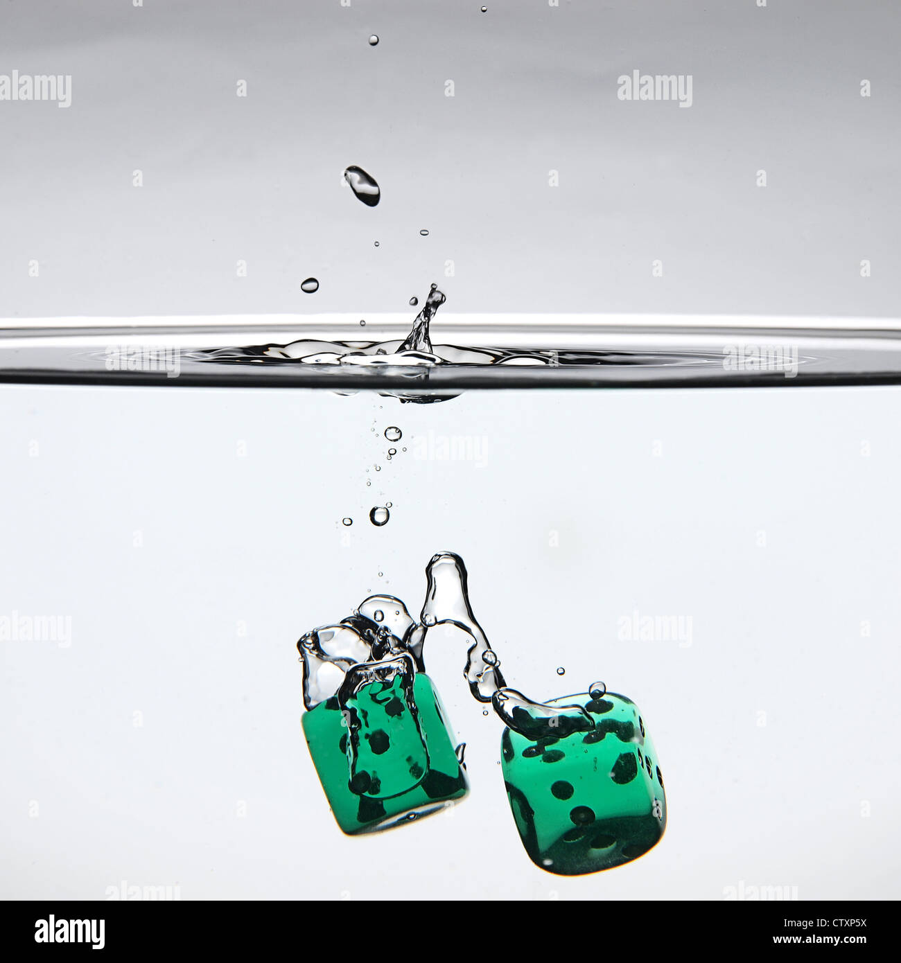Splash with dices hi-res stock photography and images - Alamy