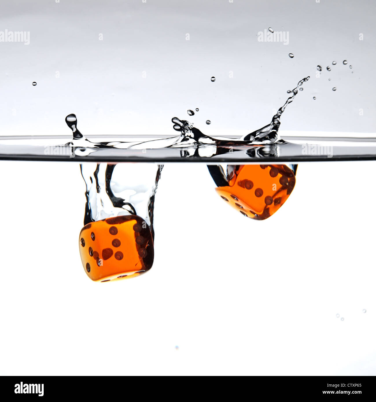 Splash with dices hi-res stock photography and images - Alamy