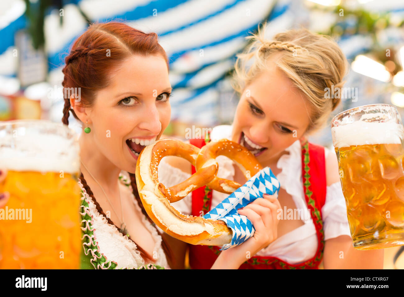 Young Women In Traditional Bavarian Clothes Dirndl Or Tracht On A