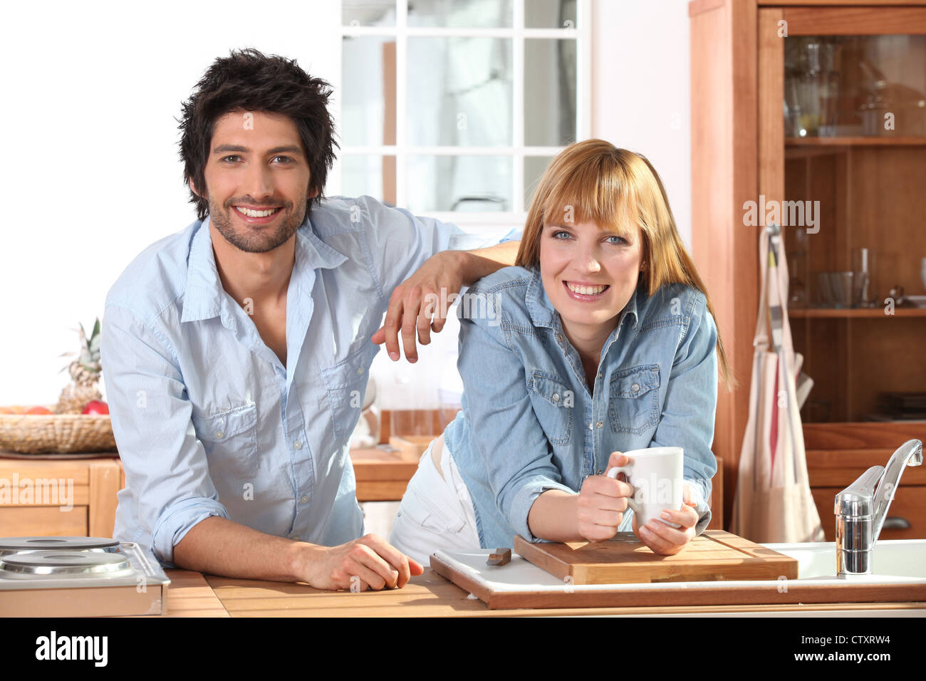 Happy couple at home Stock Photo - Alamy