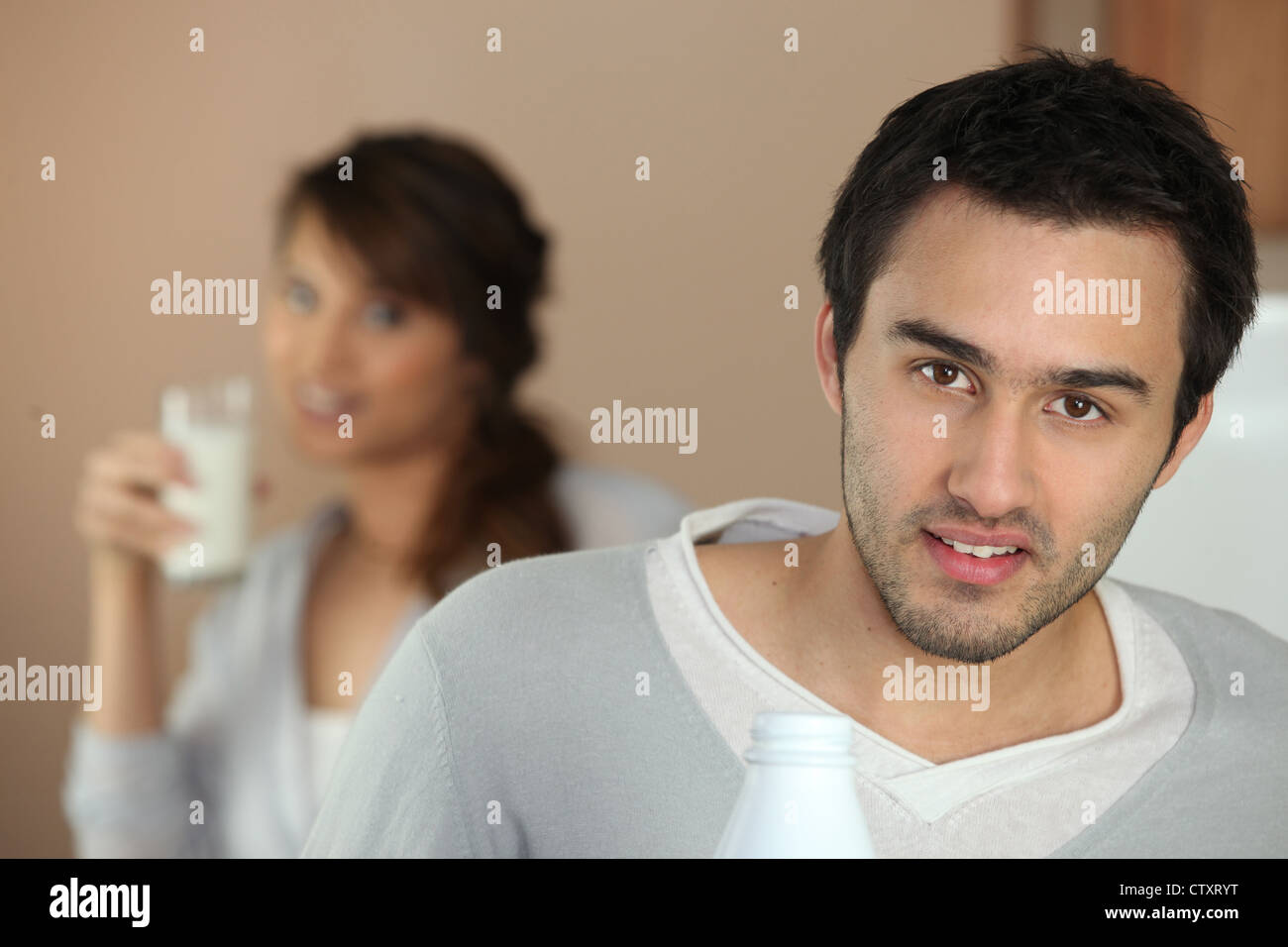couple drinking milk Stock Photo - Alamy