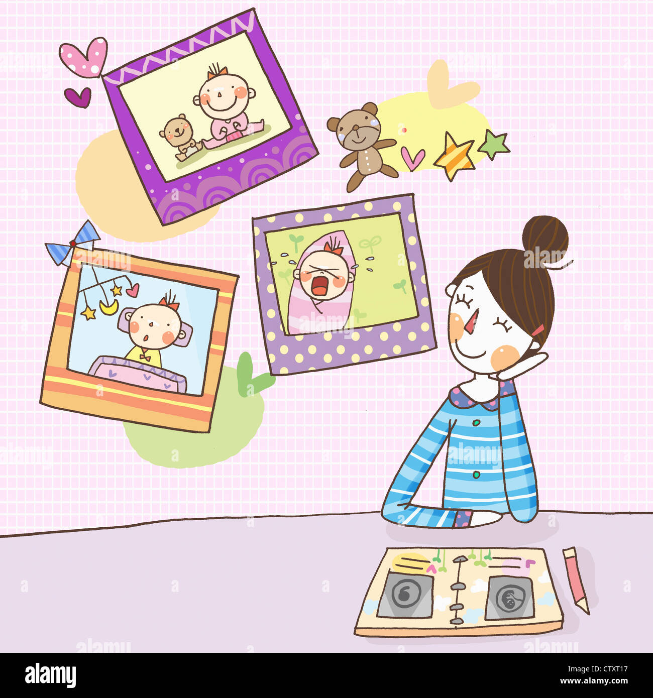 A mother collecting the photographs of baby Stock Photo - Alamy
