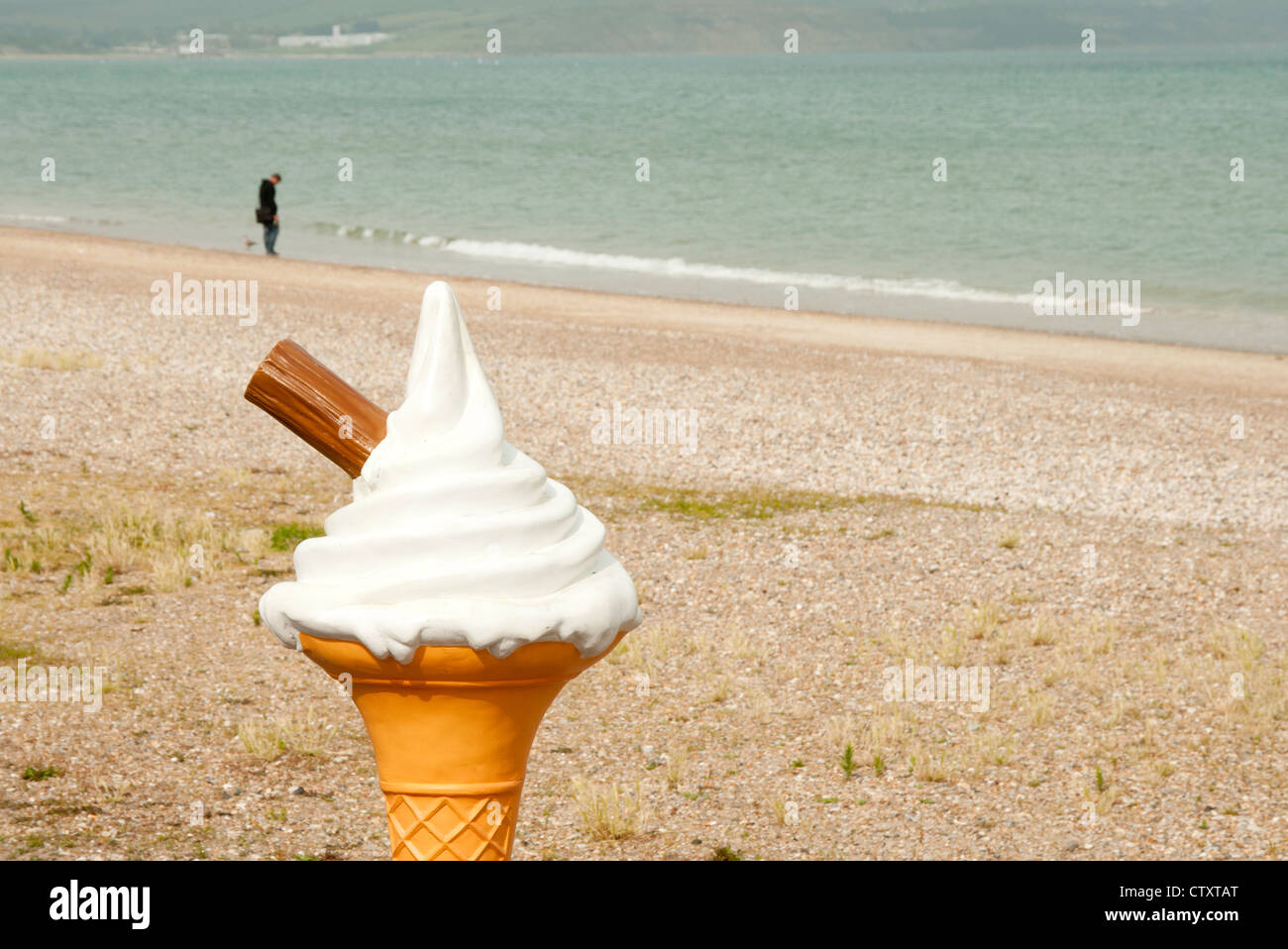 large ice cream sign on the beach Stock Photo - Alamy