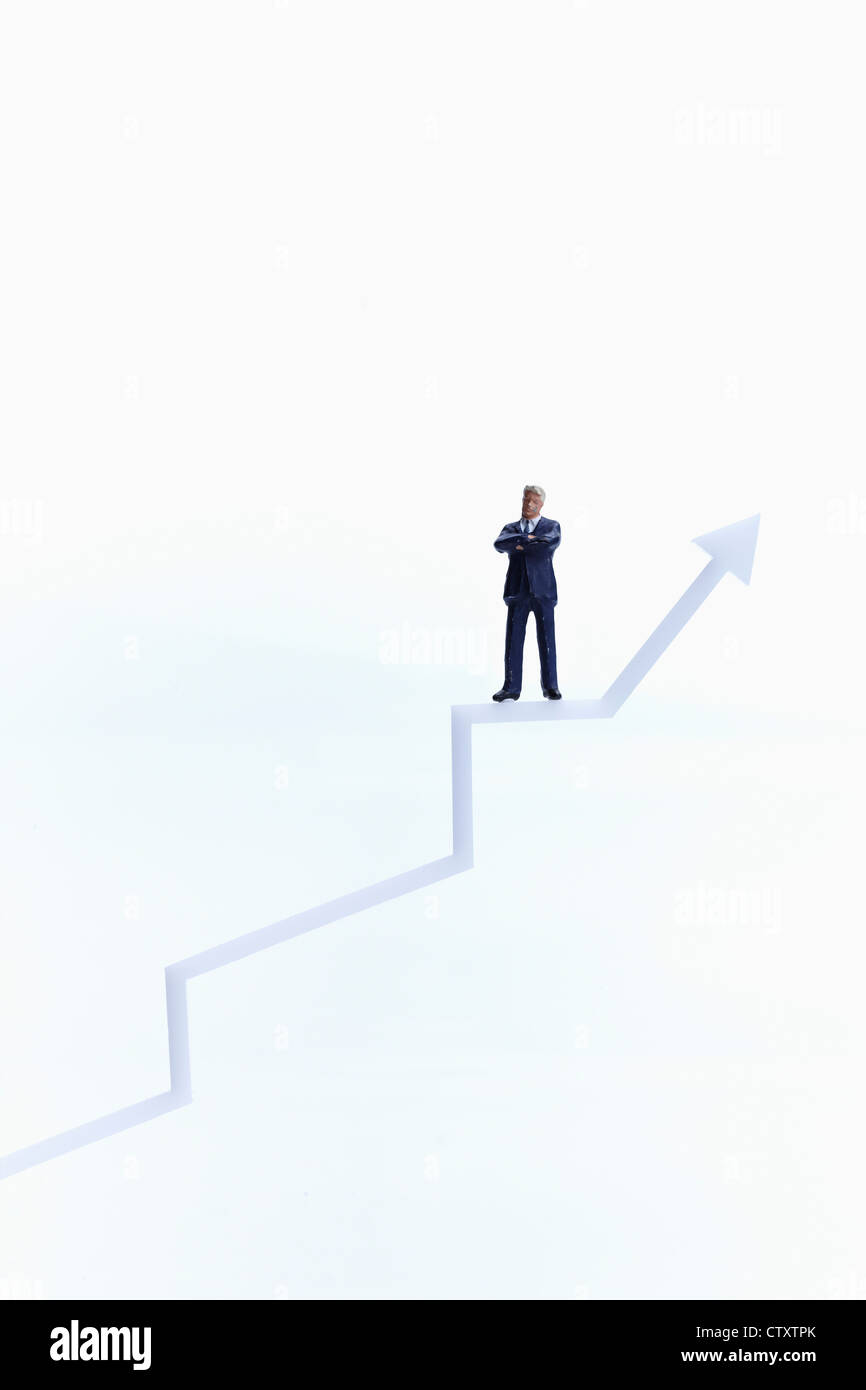 A man figure on the rising chart Stock Photo - Alamy