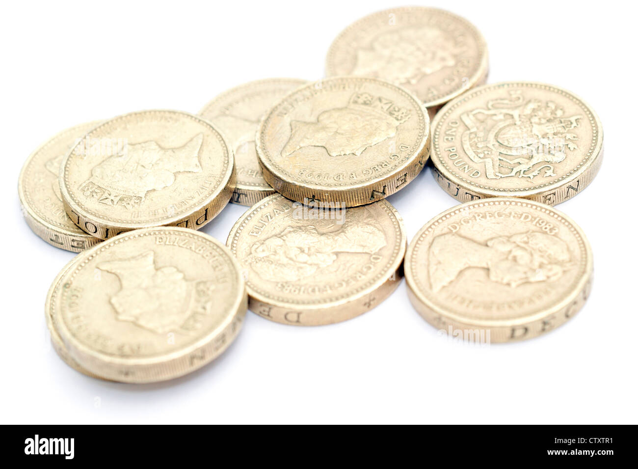 Money £1 coins on a white background Stock Photo - Alamy