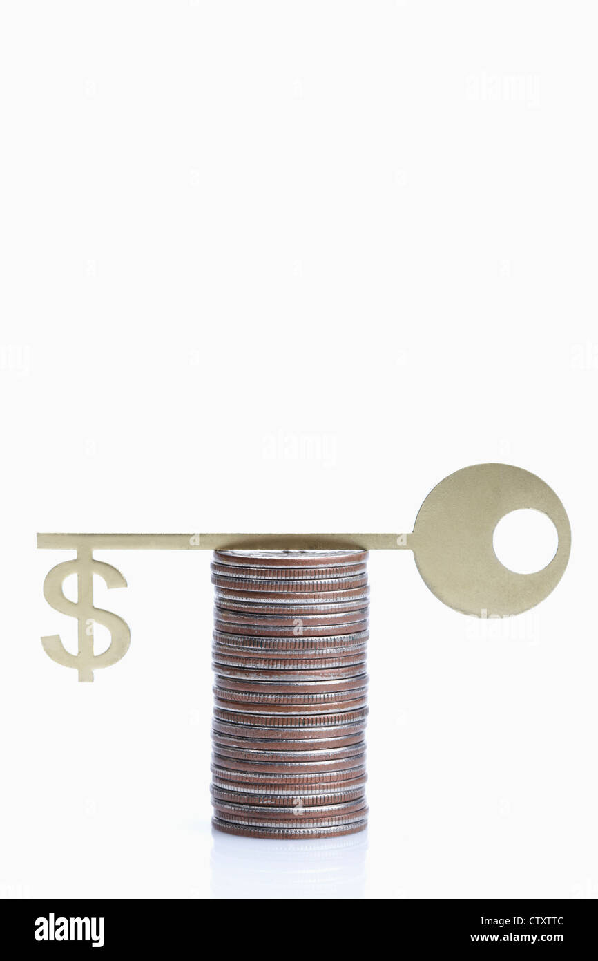 A dollar key on the coin Stock Photo - Alamy
