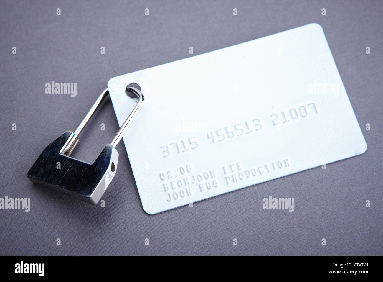 Credit card with lock Stock Photo - Alamy