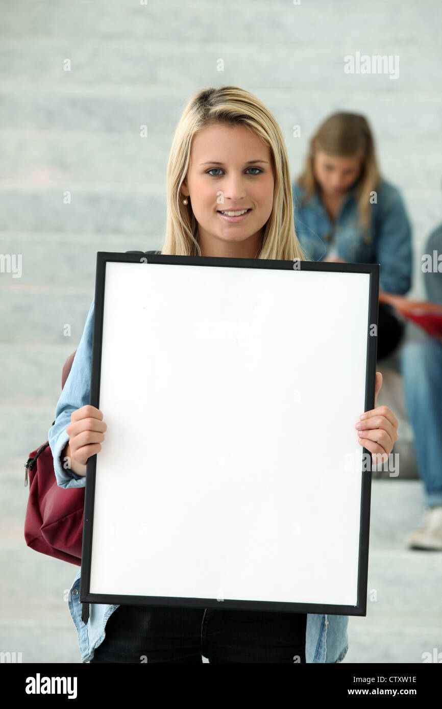 Blond student holding blank poster hi-res stock photography and images ...