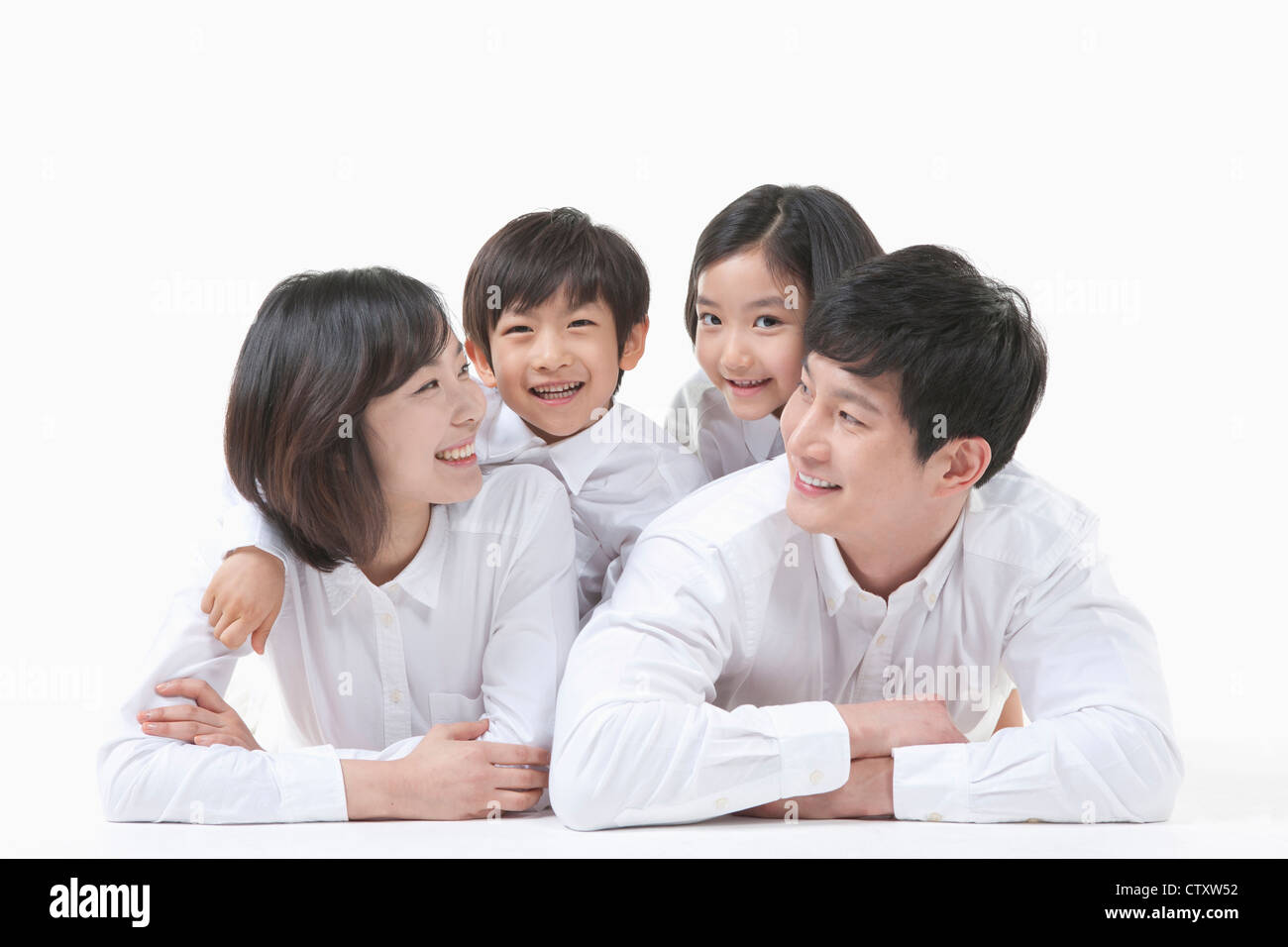 A family resting on the table Stock Photo - Alamy