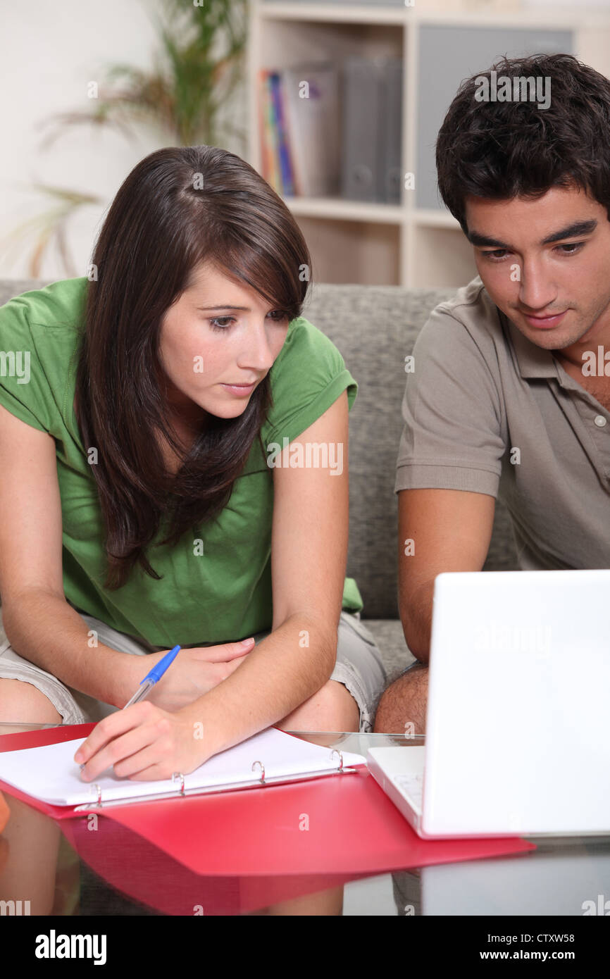 Teen doing homework Stock Photo - Alamy