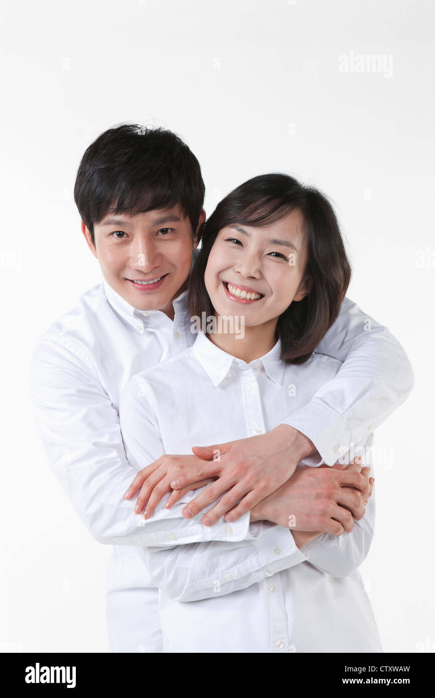 A couple hugging together Stock Photo - Alamy