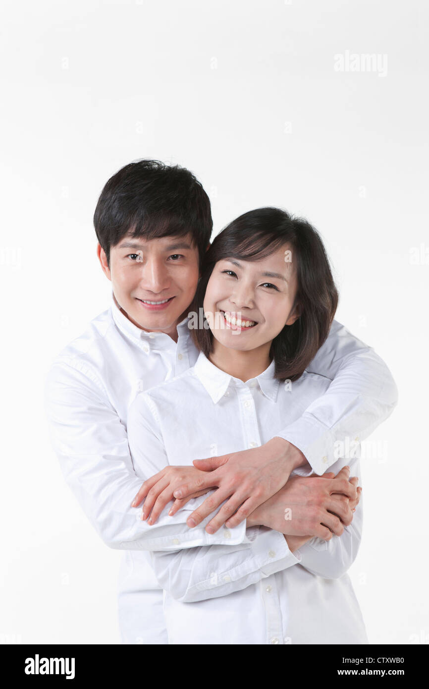 A couple hugging together Stock Photo - Alamy