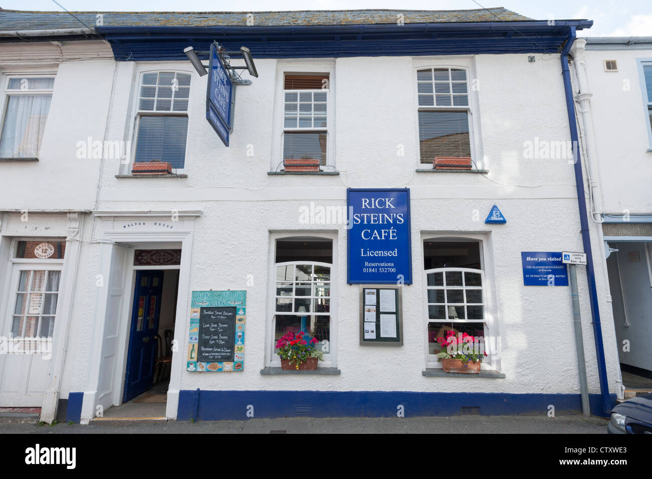 Shops and signs in Middle Street Padstow North Cornwall UK, including ...