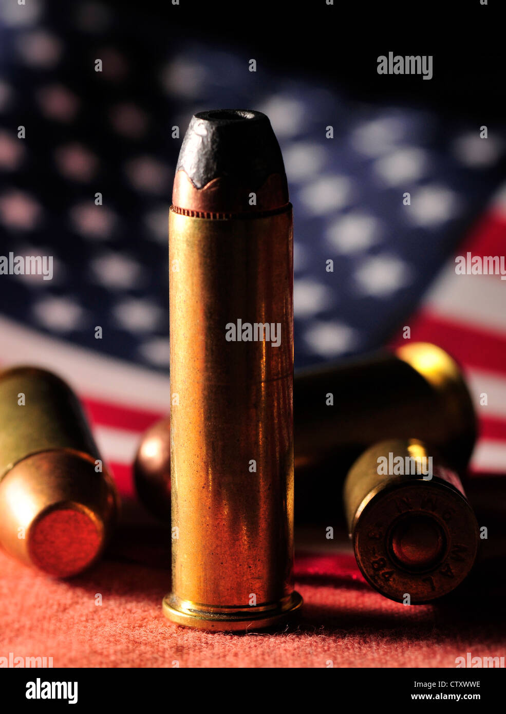 Undischarged rounds from guns with an American flag Stock Photo - Alamy