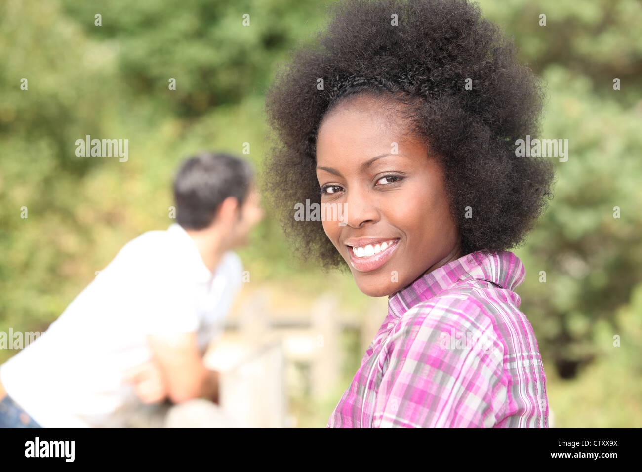 Woman backpacking through woods hi-res stock photography and images - Alamy
