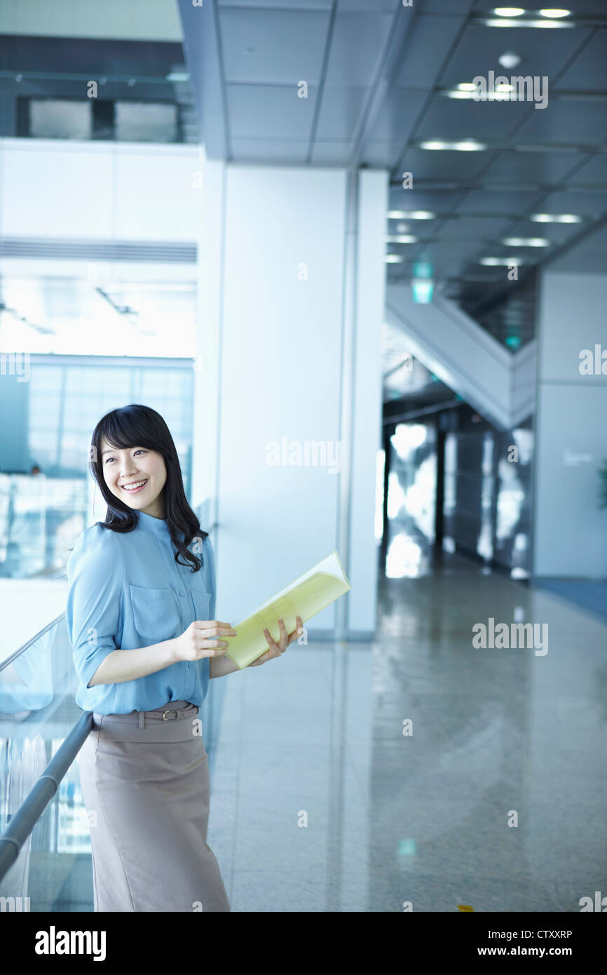 A business woman with the document file Stock Photo - Alamy