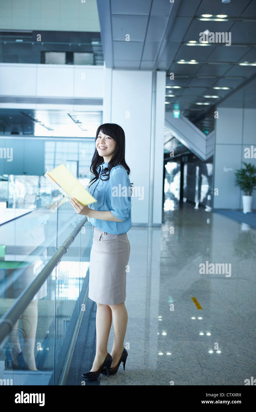 A business woman with the document file Stock Photo - Alamy