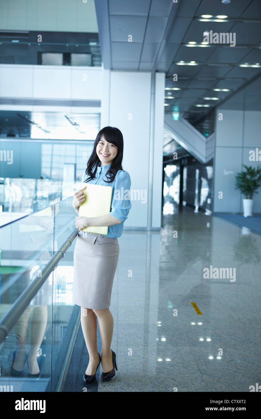 A business woman with the document file Stock Photo - Alamy