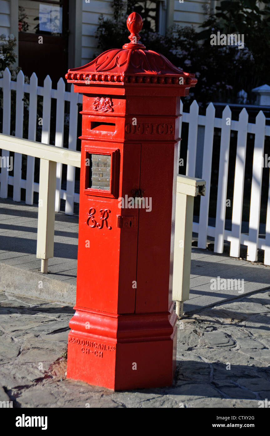A Victorian post box next to the post office is still in service today ...