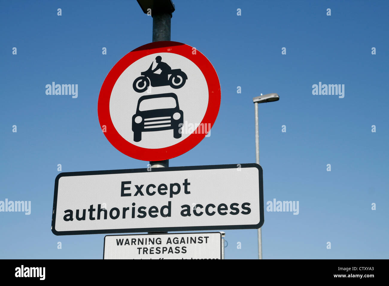 Road sign No entry motor cycles and cars Histon Cambridgeshire England ...