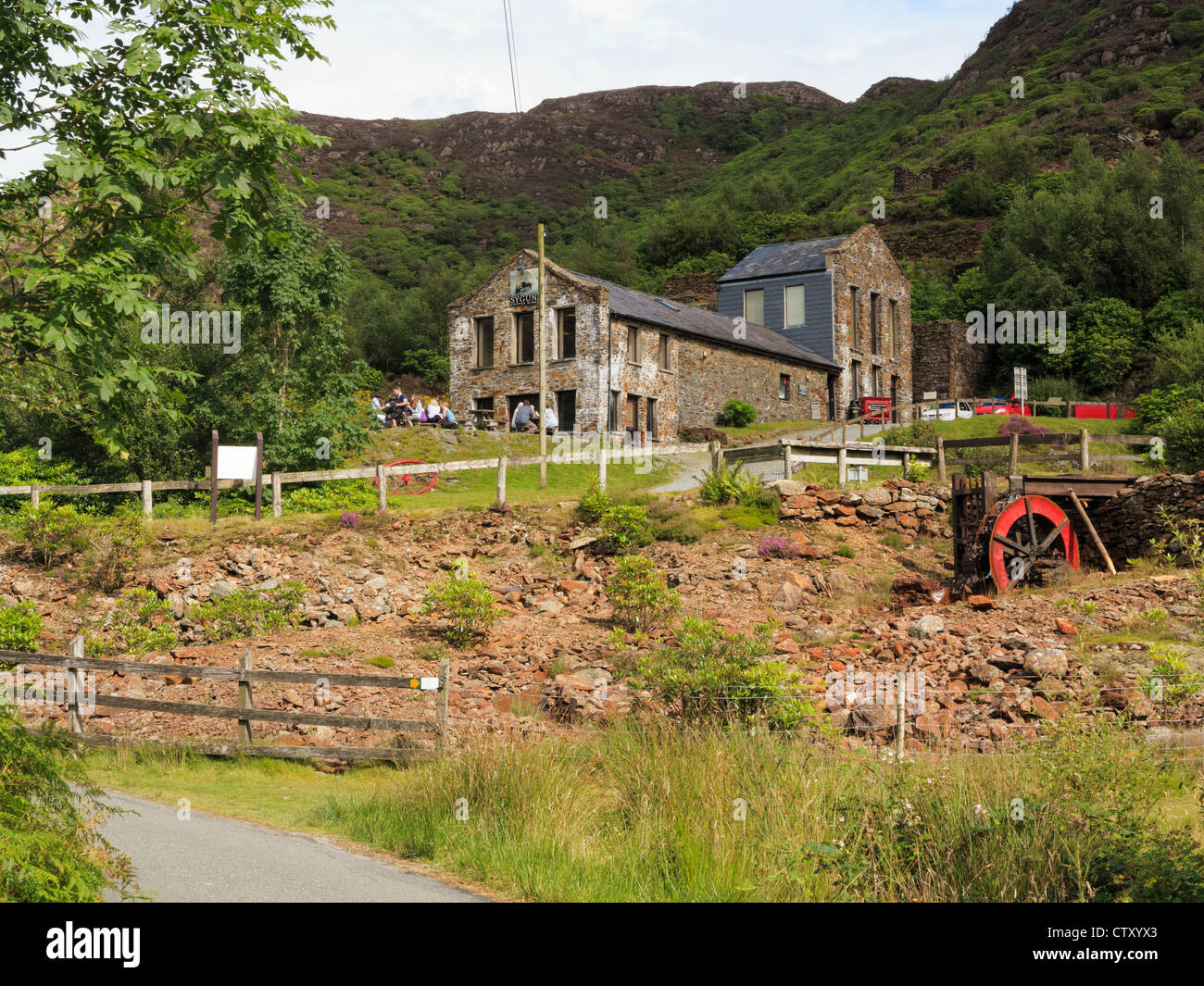 Copper coloured rocks by Sygun Copper Mine visitor centre in Snowdonia ...