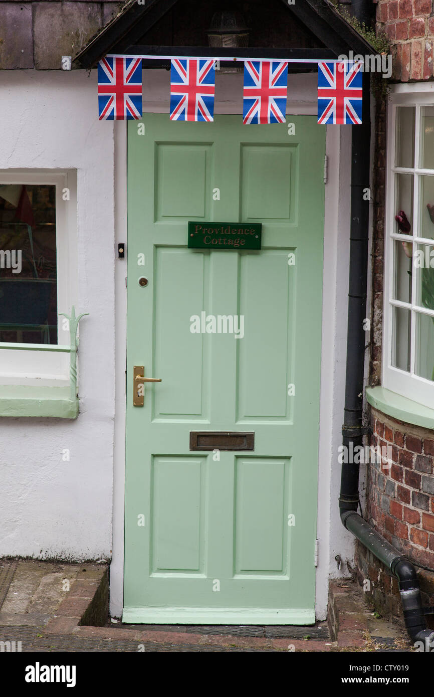 Row of union flags decorate a doorway as part of the Queen's Diamond ...