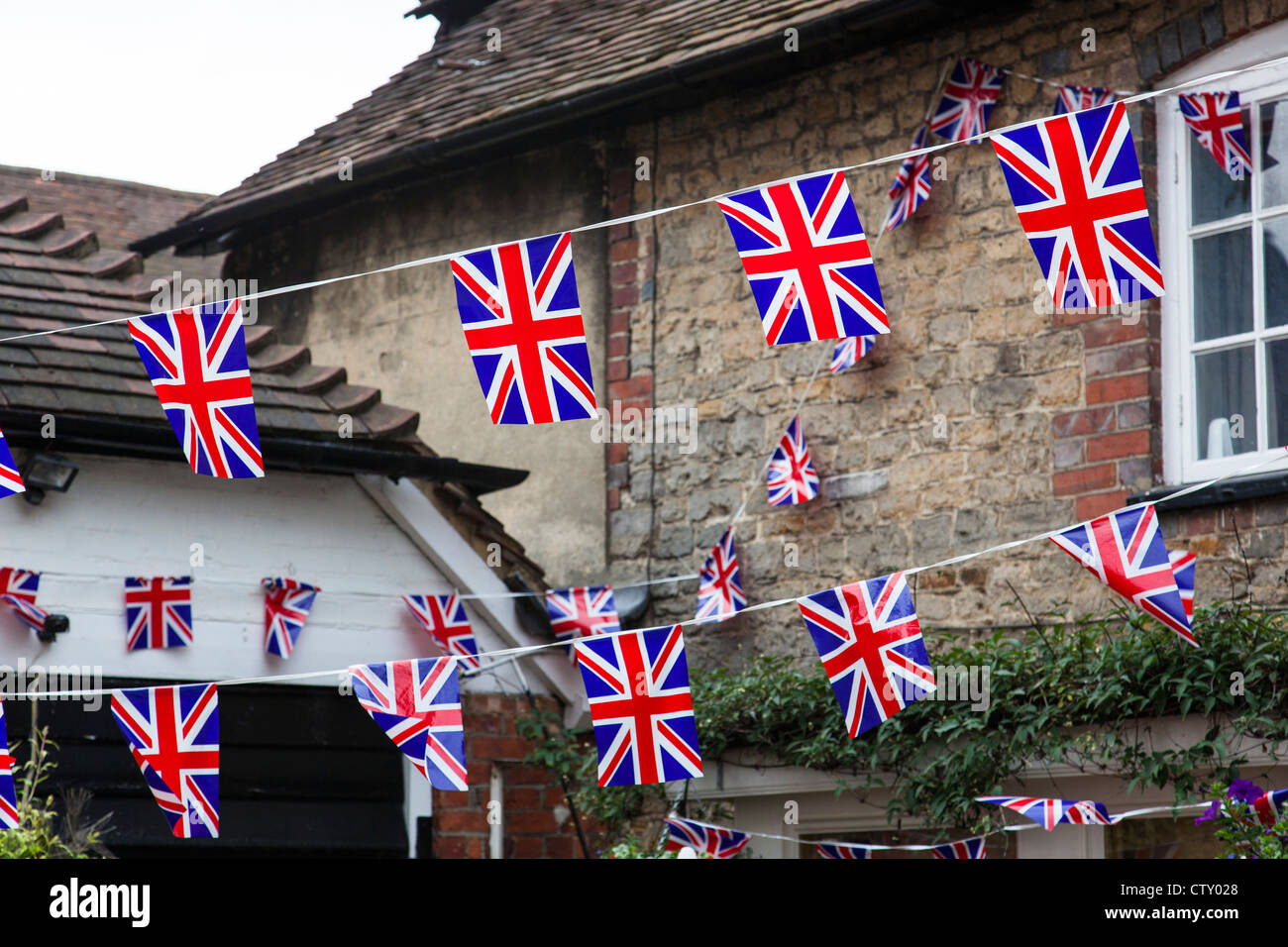 Strings of union flags decorate an outside courtyard as part of the ...