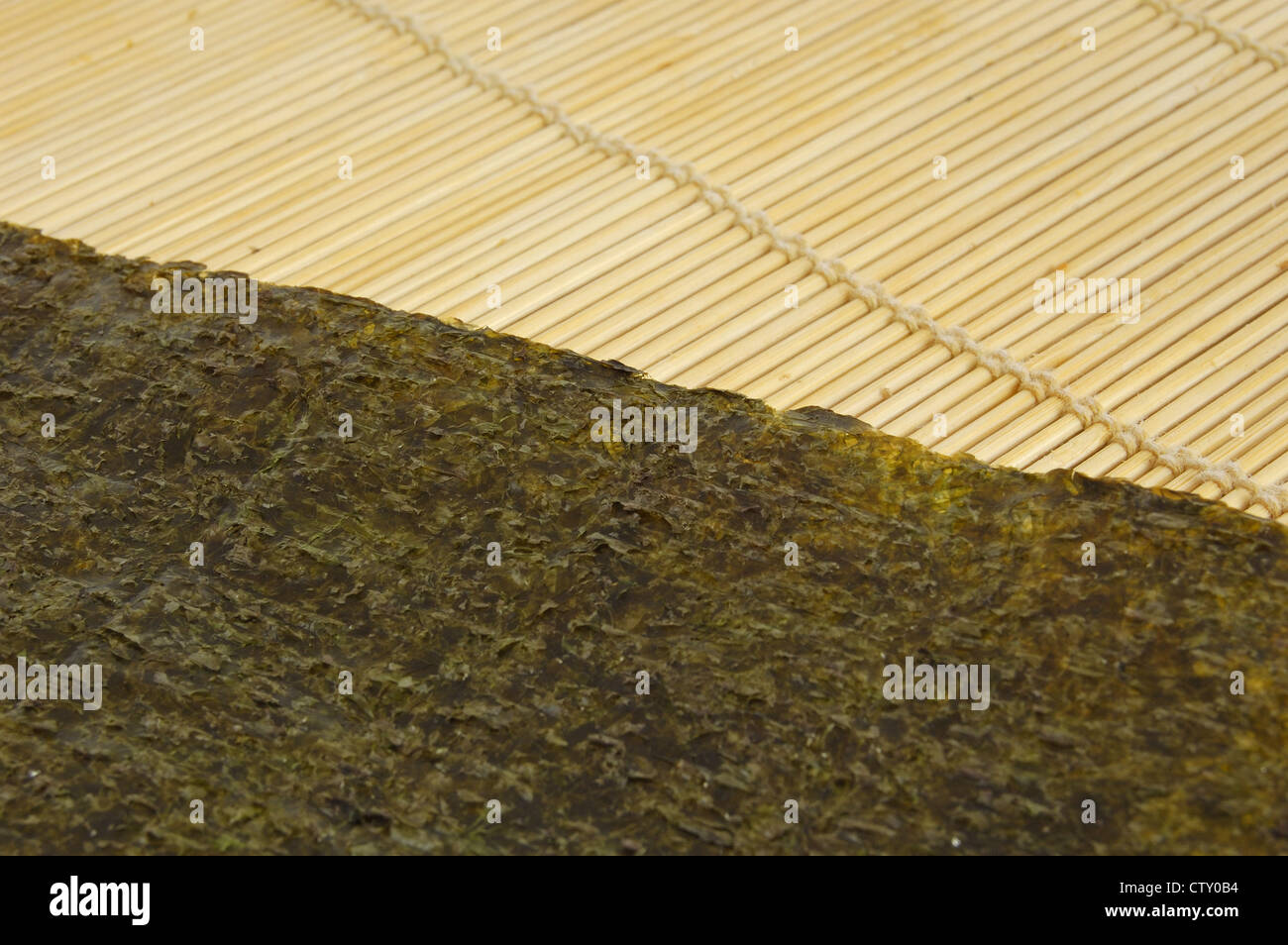 Dried green sushi nori sheet on a bamboo mat Stock Photo - Alamy