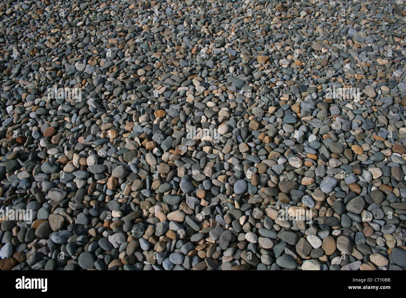 stones rocks and pebbles on the beach sea front in bray ireland county ...