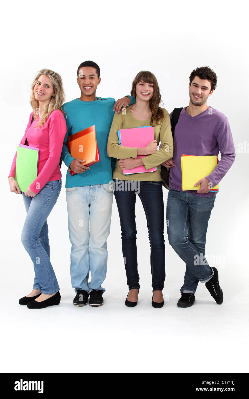 Four university students with folders Stock Photo - Alamy