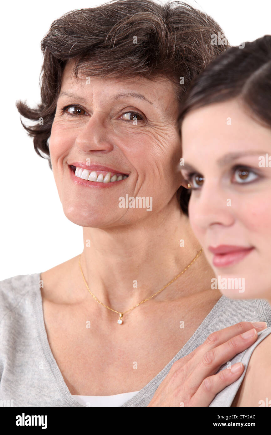 Mother supporting her daughter Stock Photo - Alamy